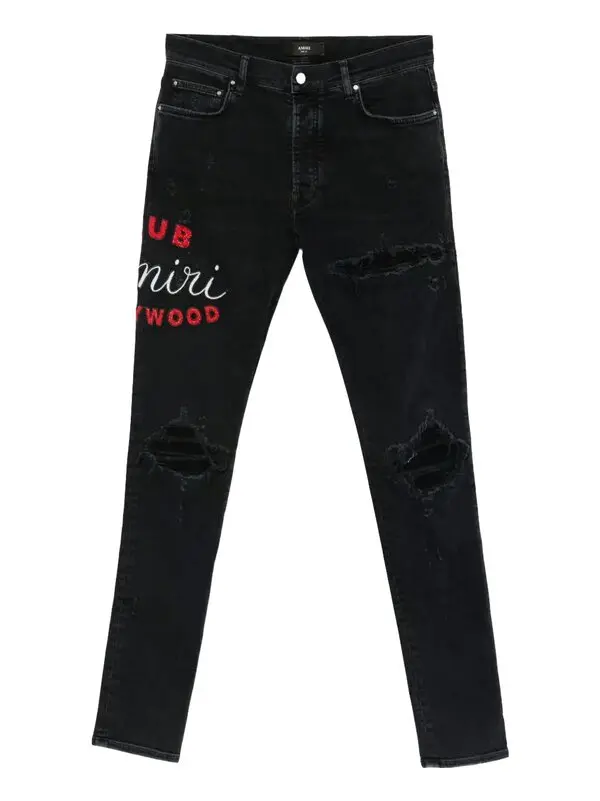 Amiri Distressed Jeans With Embroidered Lettering - Black