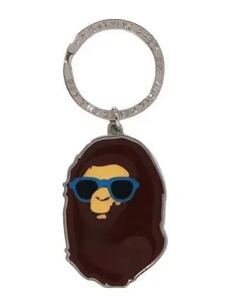 A BATHING APE Resort Ape Head Metal Keychain - Brown