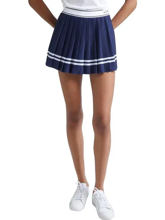 SPORTY & RICH Italic Logo Pleated Skort - Dark Navy/white