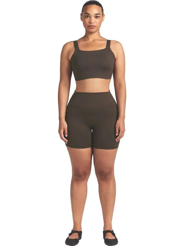 SKIMS Wide Strap Bra | Black | | Nike Matte - Dark Sepia