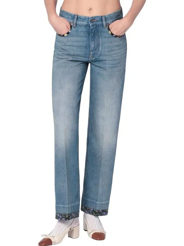 Valentino Garavani Washed Denim Jeans With Floral Trims - Blue