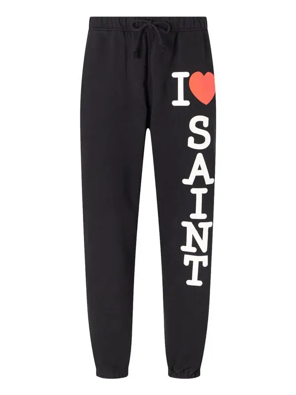 SAINT MXXXXXX I Love Saint Tapered Printed Cotton-jersey Sweatpants - Black