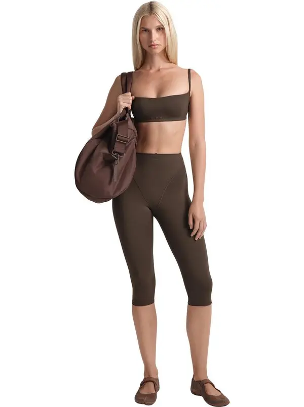 SKIMS 17" V Line Crop Legging | Deep Neutral | | Nike Matte - Dark Sepia