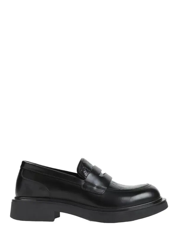 Gucci Monogram Debossed Loafers - Black