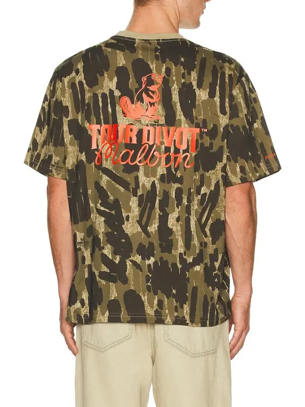 MALBON Tour Divot Bermuda Tee In Green - Bark Camo