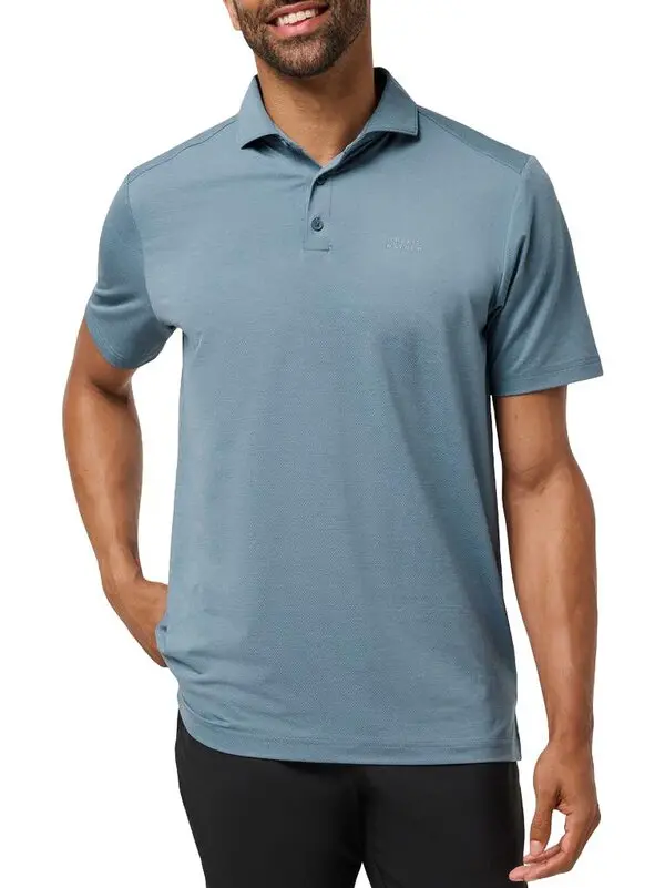 Travis Mathew The Heater Solid Short Sleeve Performance Polo - Blue Horizon
