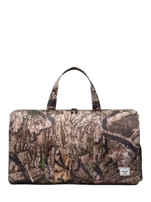 Herschel Supply Co. Novel Duffle Bag - Realtree Apx Camo