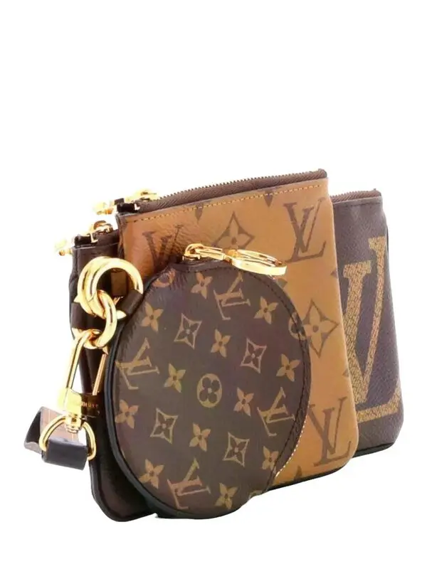 LOUIS VUITTON Trio Pouch Set Reverse Monogram Giant - Brown