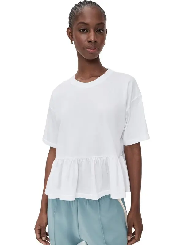 The Great. Oversized Ruffle Peplum Tee - True White