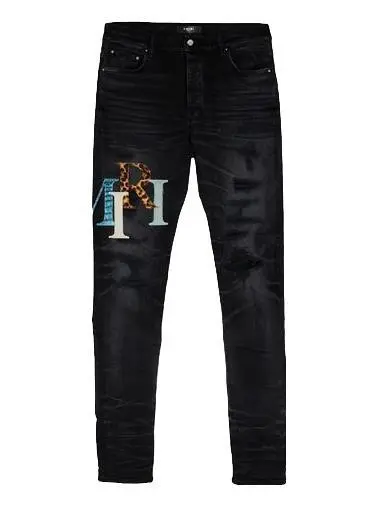 Amiri Skinny Jeans With Leather Trims - Black