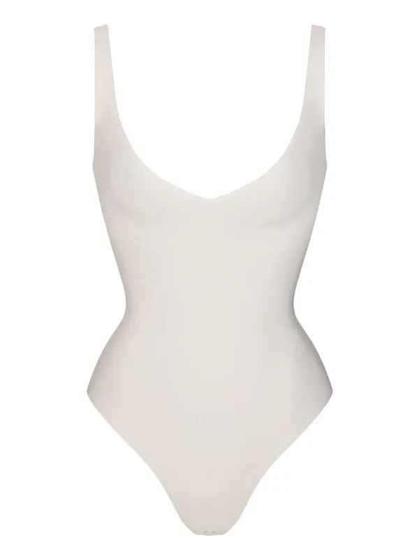 SKIMS Unlined Plunge Thong Bodysuit - Ivory