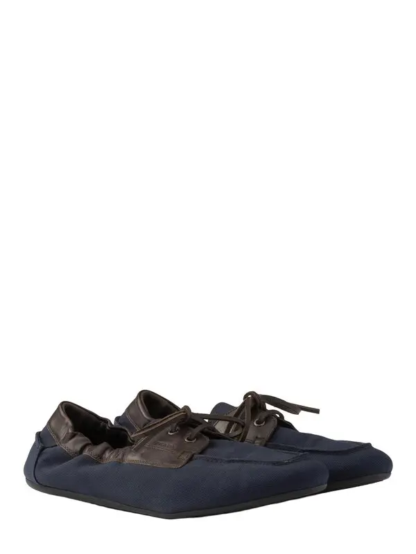 Prada Aged Canvas And Leather Boat Shoes - Blue