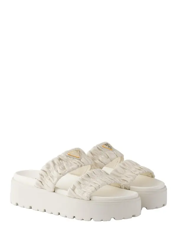 Prada Matelassé Nappa Leather Flatform Slides - White