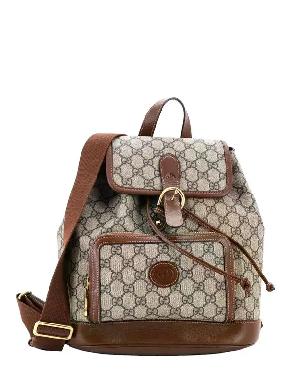 Gucci Interlocking G Patch Drawstring Flap Gg Coated Canvas Medium Backpack - Brown