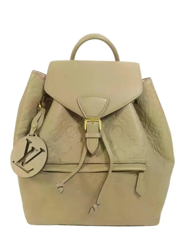 LOUIS VUITTON Montsouris Backpack In Beige Monogram Empreinte Leather - Neutrals