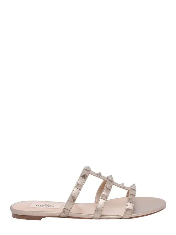Valentino Garavani Rockstud Flat Sandals In Laminated Leather - Gold
