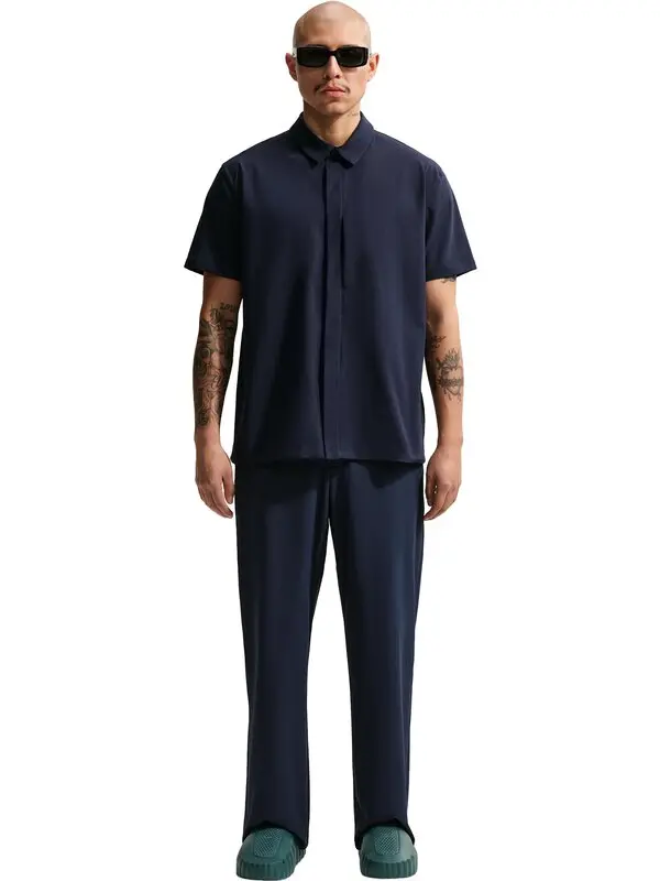 Nike 24.7 Perfectstretch Dri-fit Loose-fit Chino Trousers - Blue