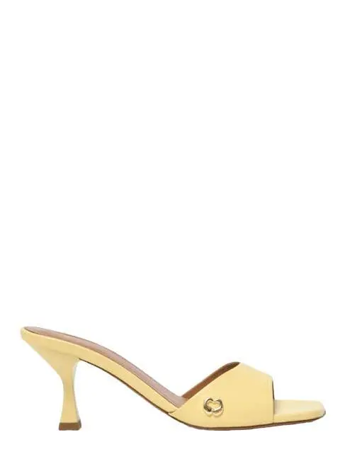 Maje Leather Mules With Gold Clover Logo - Pale Yellow