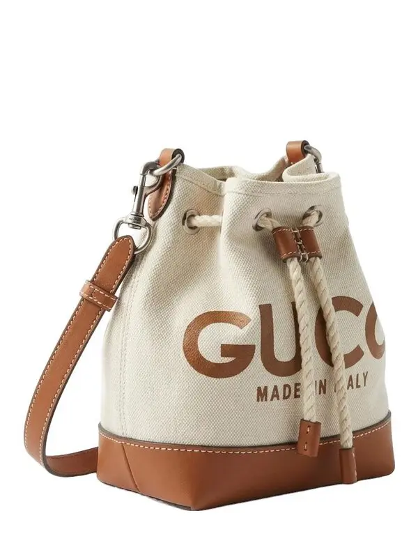 Gucci Logo Print Leather Trimmed Bucket Bag - Nude
