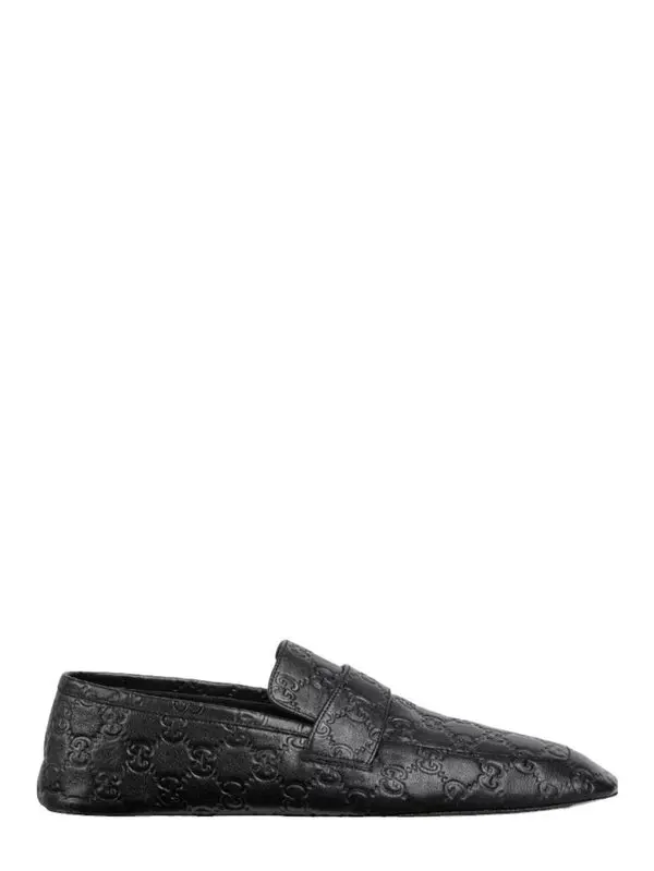 Gucci Logo Embossed Leather Loafers - Black