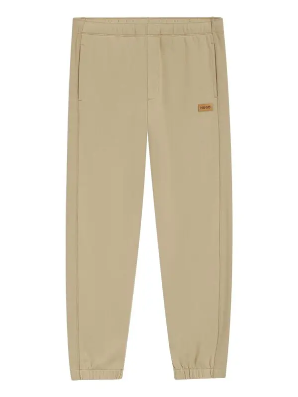 Hugo Cotton-terry Sweatpants With Logo Badge - Beige