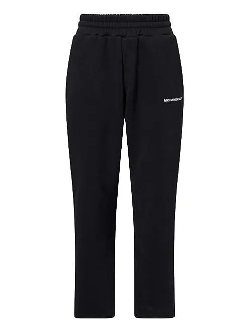 MKI MIYUKI ZOKU Logo-print Wide-leg Cotton Jogging Bottoms - Black