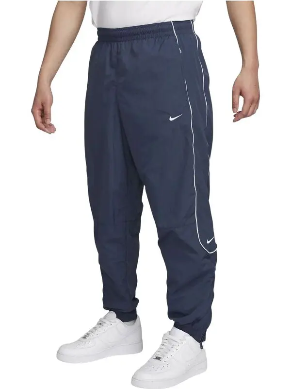 Nike Solo Swoosh Knit Zippered Pants - Thunder Blue