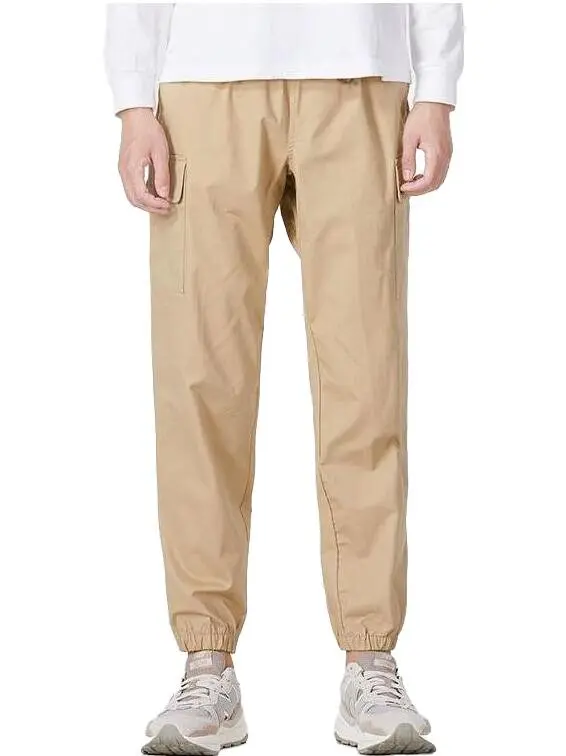 NEW BALANCE Athletics Woven Cargo Pants Asia Sizing - Khaki