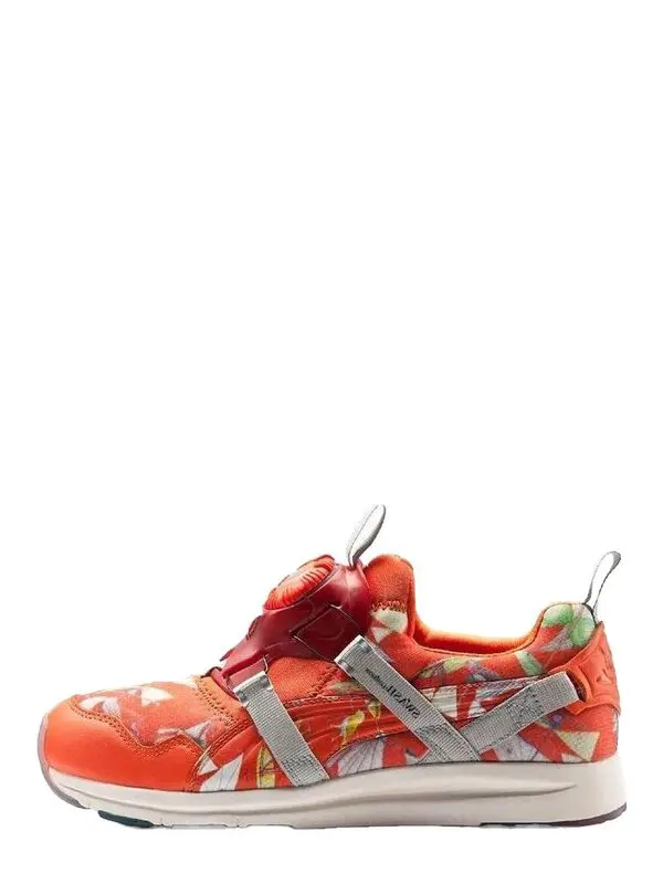 PUMA Swash O X Haast Disc "nasturtium - Orange/white