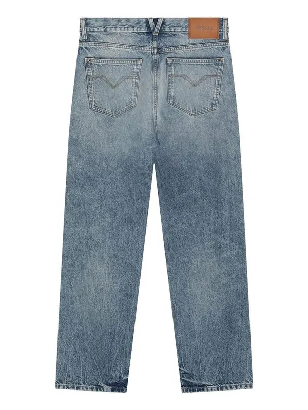 Versace Washed Denim Jeans With Stud Embellishments - Blue