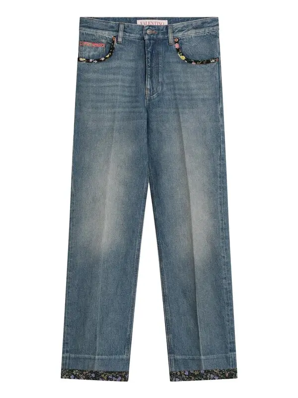 Valentino Garavani Washed Denim Jeans With Floral Trim - Blue