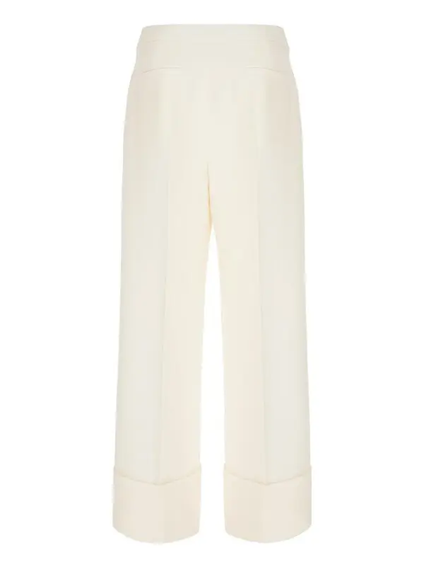 Valentino Garavani Cropped Trousers With Gold Tone V Detail - Multicolor