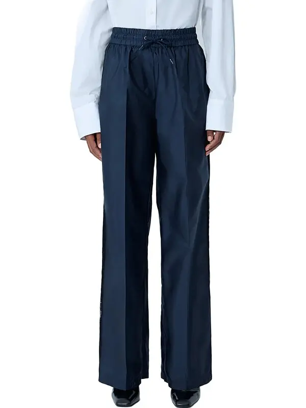 Prada Nylon Logo Plaque Track Pants - Blue