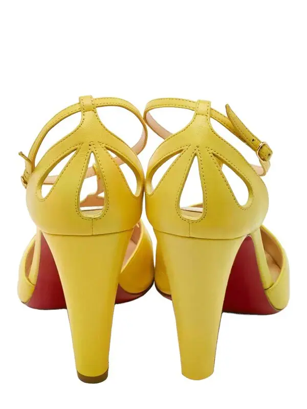 CHRISTIAN LOUBOUTIN Leather Cut-out T-bar Pumps - Yellow