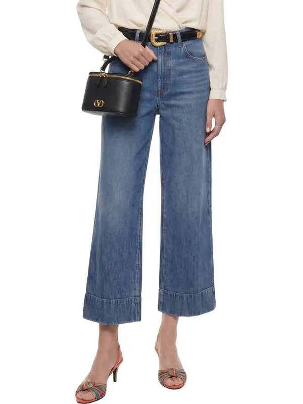 Valentino Garavani Cropped Flare Jeans With Signature V Plaques - Blue