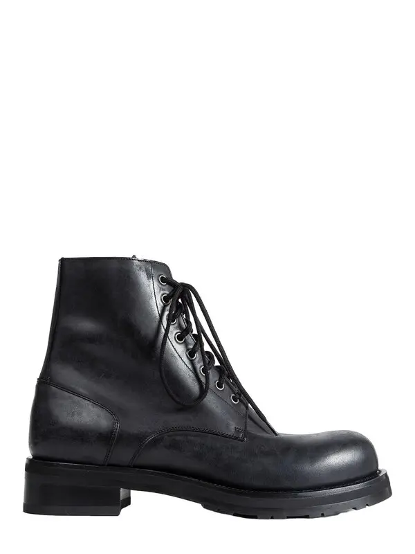 THE ROW Lug Sole Lace-up Distressed Leather Boots - Black