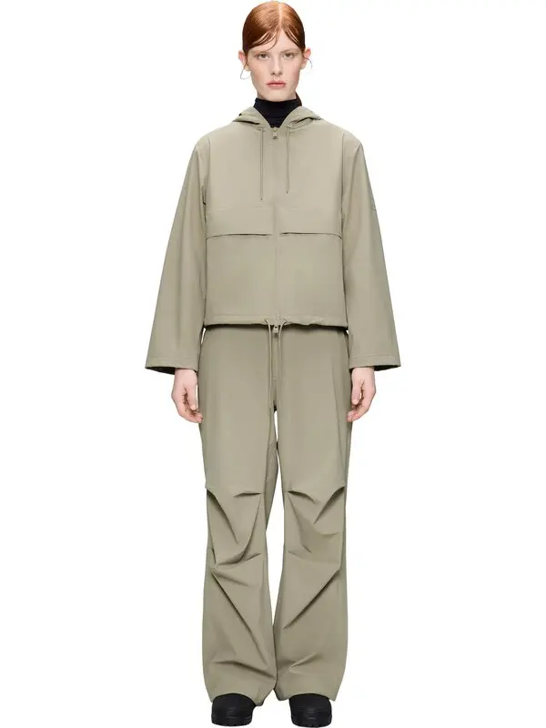 Rains Suva Hardshell Cropped Jacket With Drawstring Hood And Zip Pockets - Beige