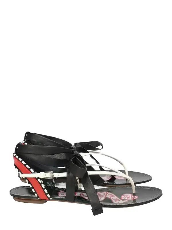 Alaïa Graphic Print Gladiator Sandals - Black