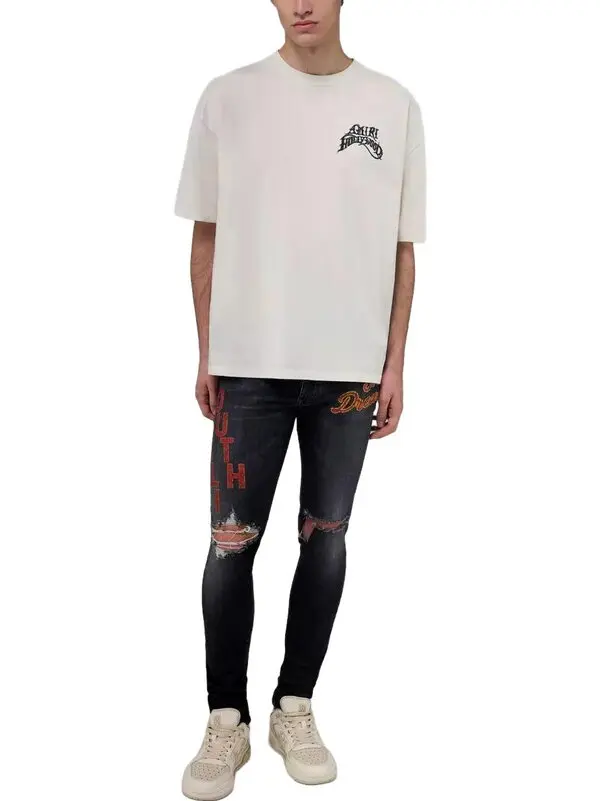 Amiri South Cali Distressed Skinny Jeans - Washed Black
