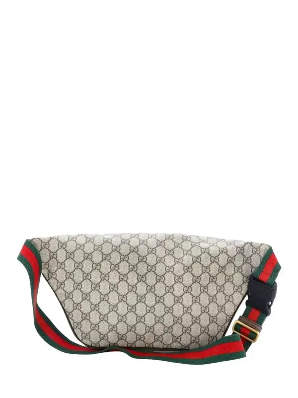 Gucci Gg Coated Canvas Belt Bag With Applique - Brown