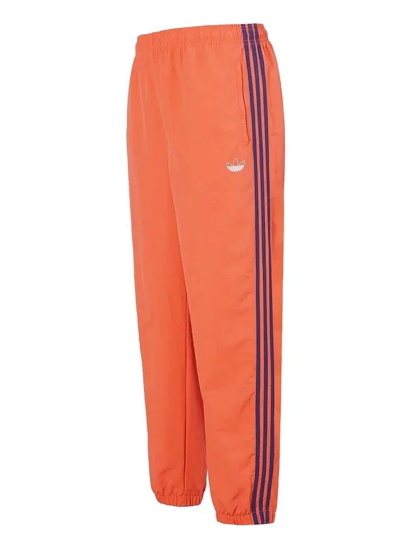 Adidas Originals Woven Three Stripe Warm Up Pants - Orange