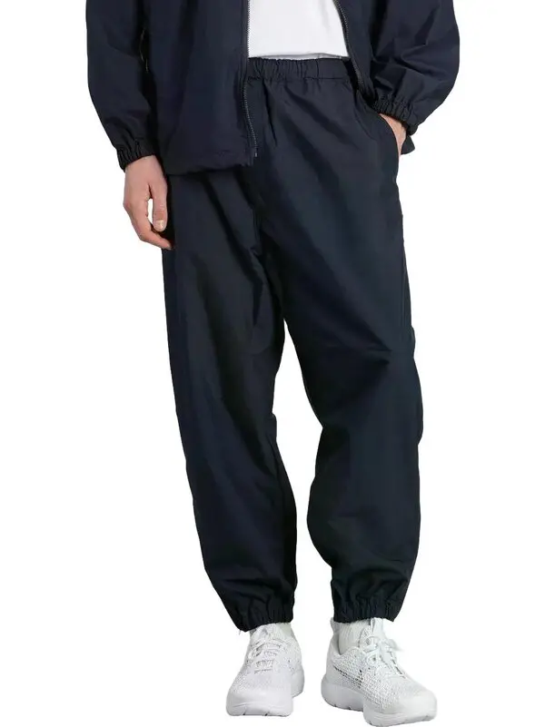 Comme Des Garçons Elasticated-cuff Track Pants - Blue