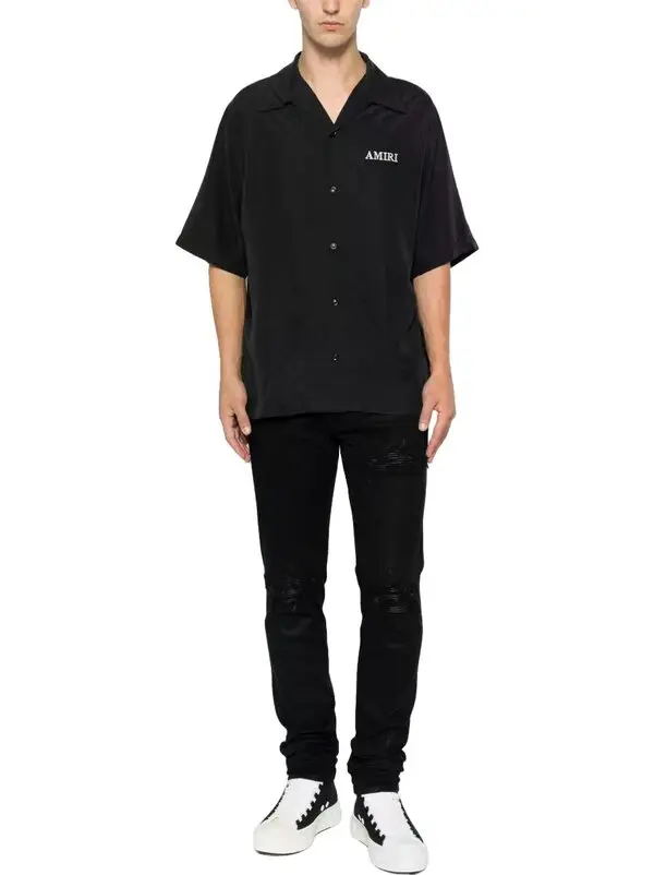 Amiri Coated Distressed Effect Jeans - Black