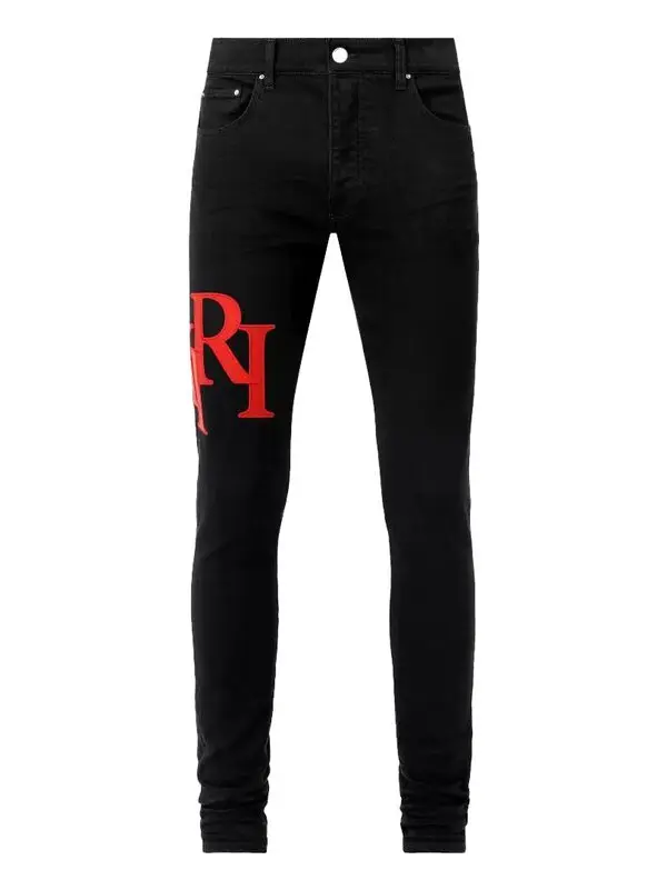 Amiri Skinny Jeans With Staggered Logo Detail - Black