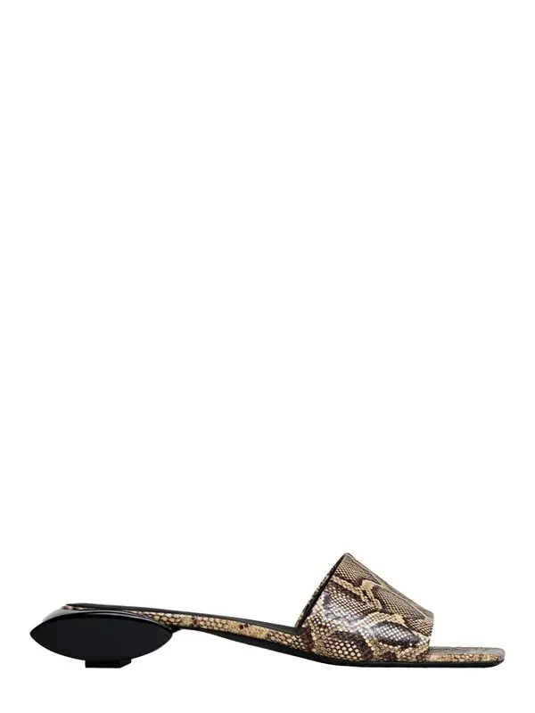 Alaïa Suede Ellipse Mules - Yellow