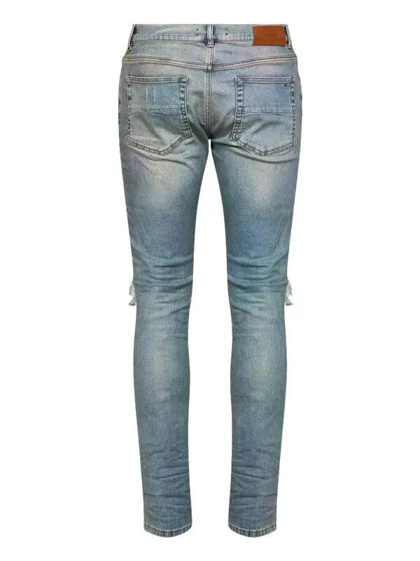 Amiri Distressed-effect Patched Jeans - Blue