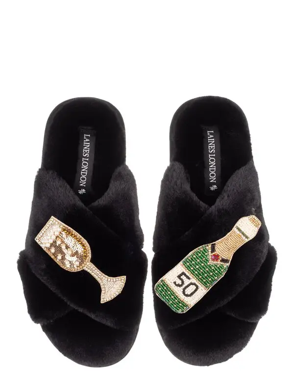 LAINES LONDON Embellished Faux Fur Cross Strap Slippers With Champagne And '50' Brooches - Black