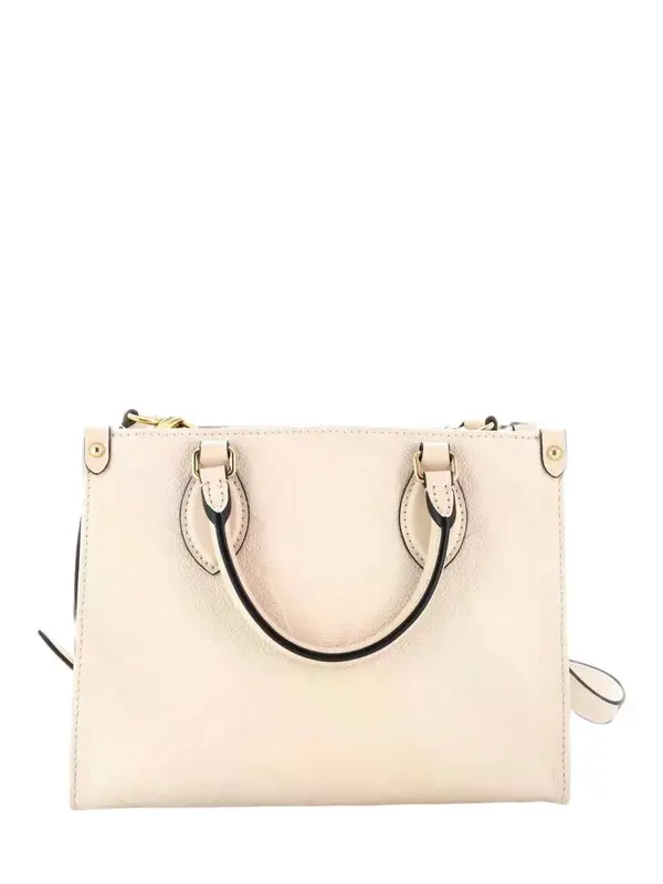 LOUIS VUITTON Onthego Pm Monogram Empreinte Giant Shoulder Bag - Neutrals