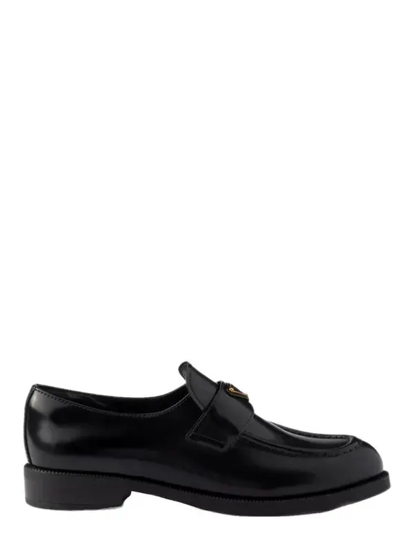 Prada Brushed Leather Loafers With Enamelled Metal Logo - Black