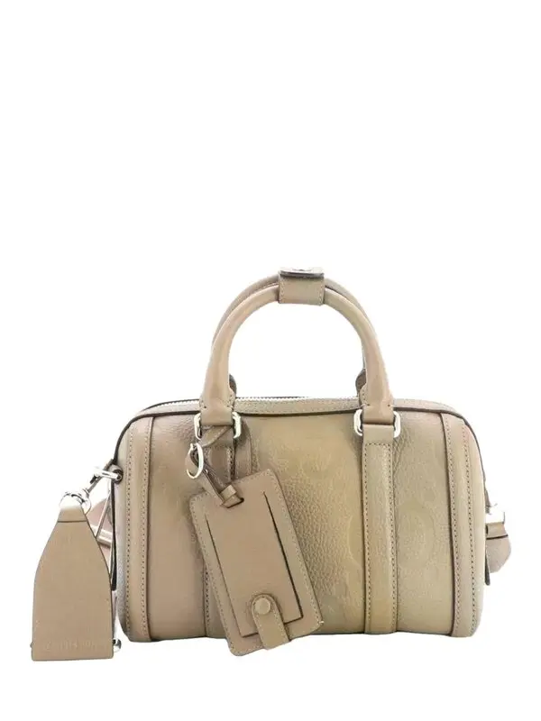 Gucci Jumbo Gg Embossed Leather Mini Travel Bag - Brown